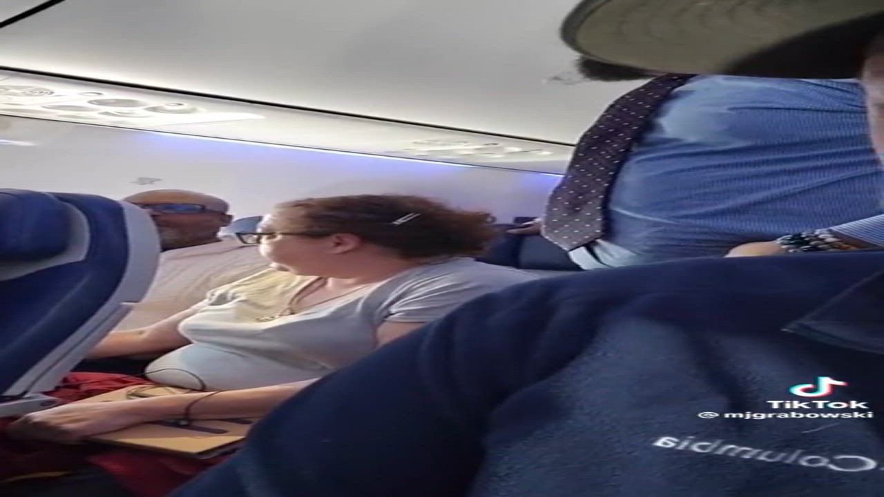 Grown Man Gets Completely Triggered By A Baby Being A Baby On A Plane - Brighteon.com